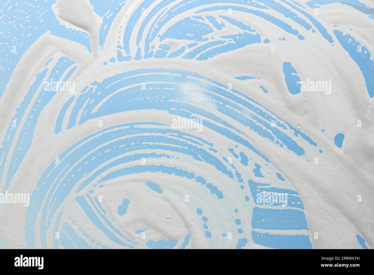 Glass covered with suds as background, view from inside Stock Photo - Alamy