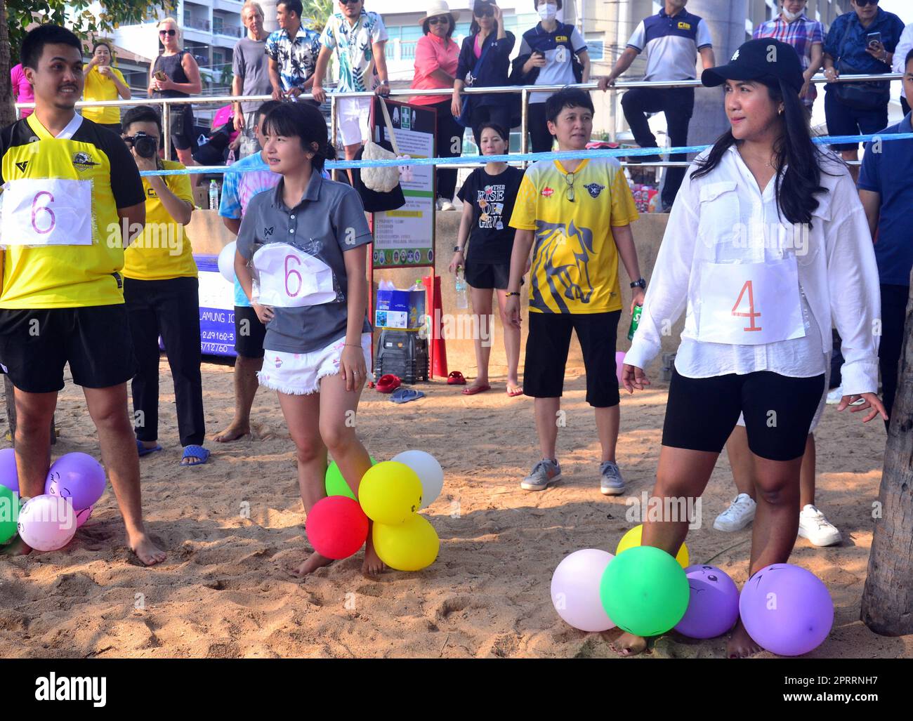 A game which can be called balloon stomp where a group of players step ...