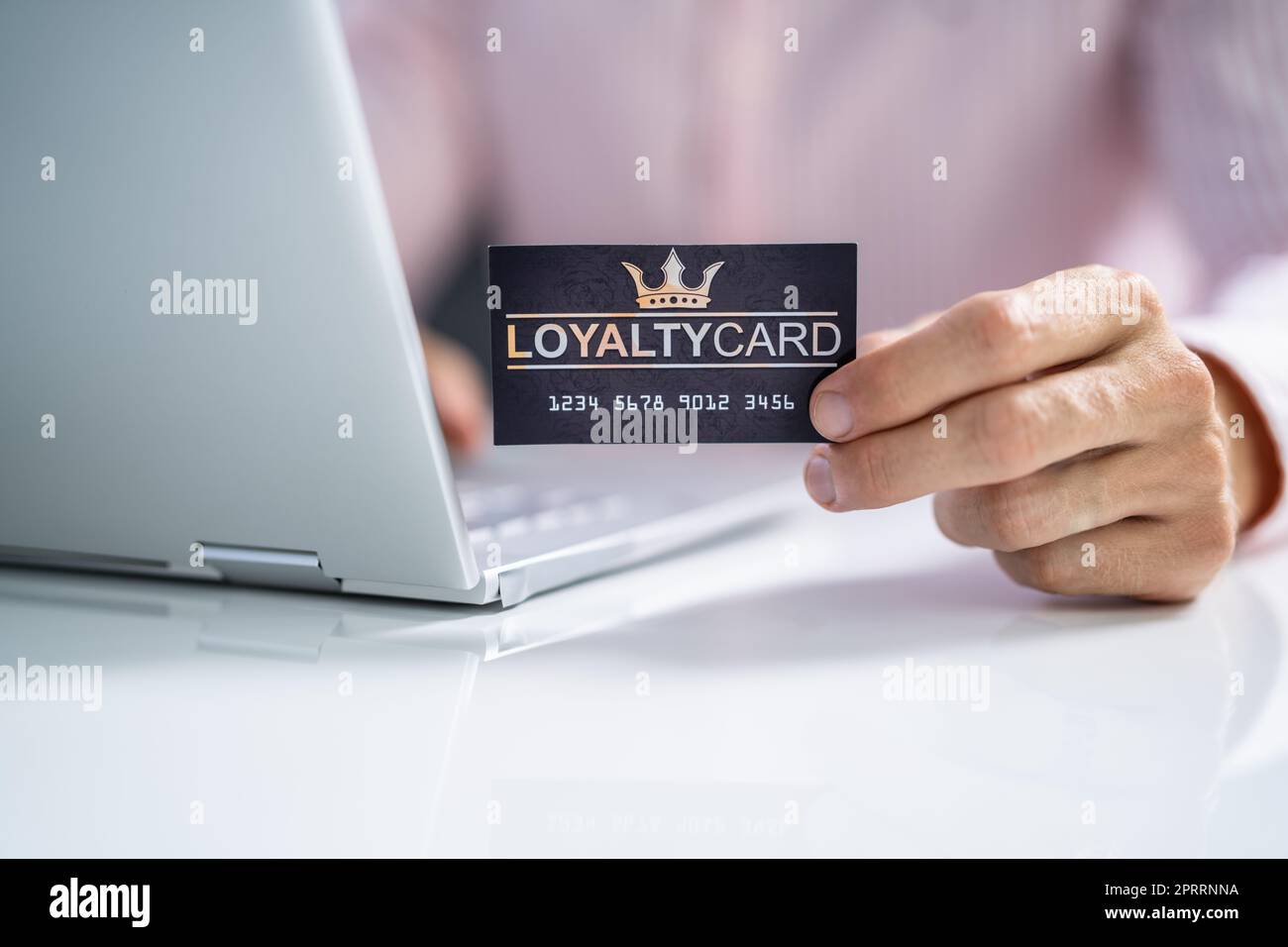 Hand Holding Loyalty Rewards Bonus Program Stock Photo - Alamy