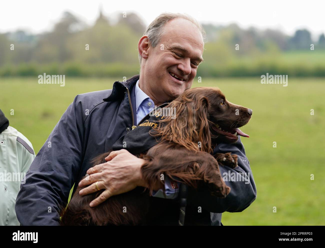 Liberal Democrat leader Sir Ed Davey holds Diggory, a Cocker Spaniel ...