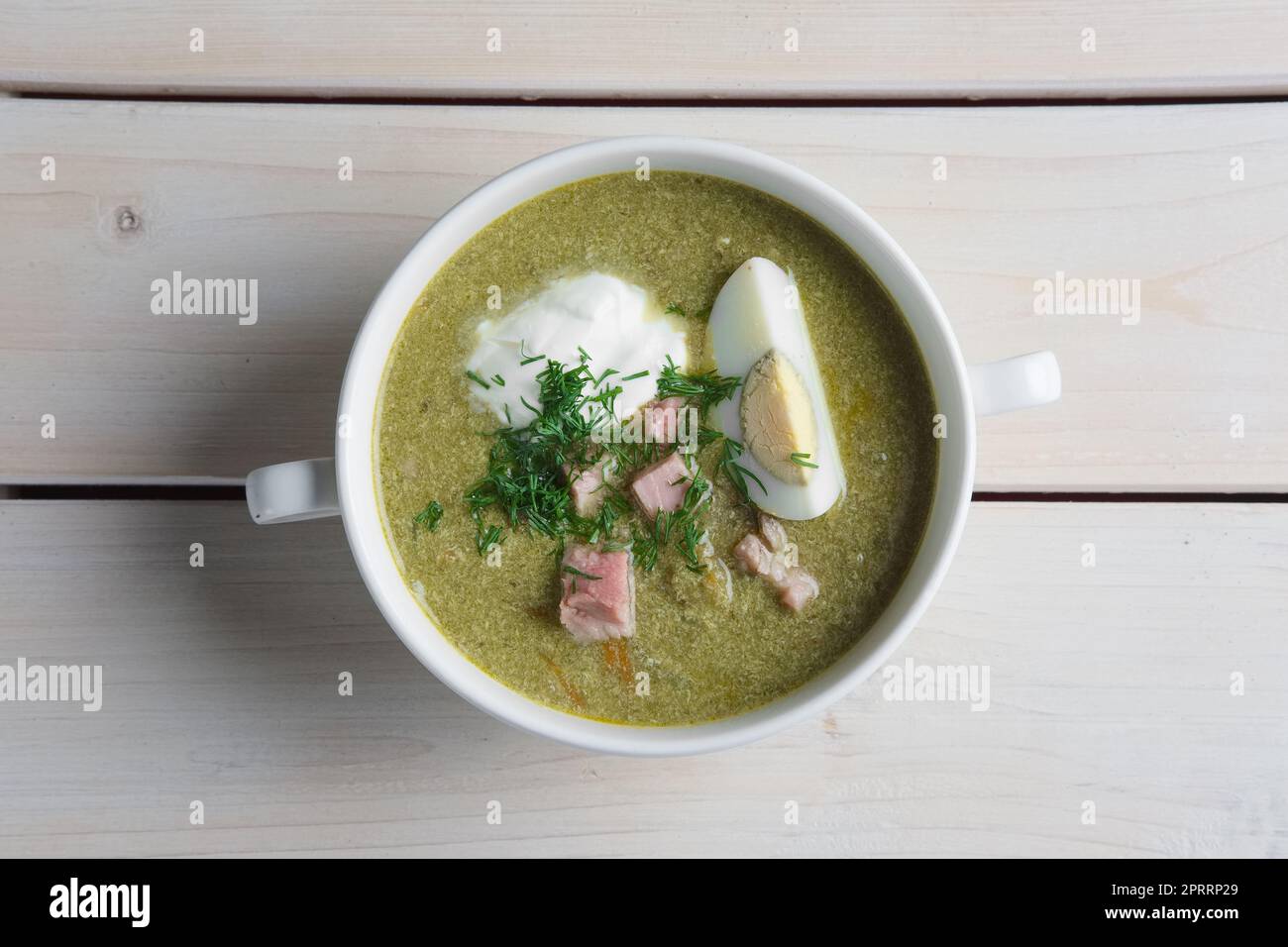Top view of soup-puree with han and egg Stock Photo - Alamy