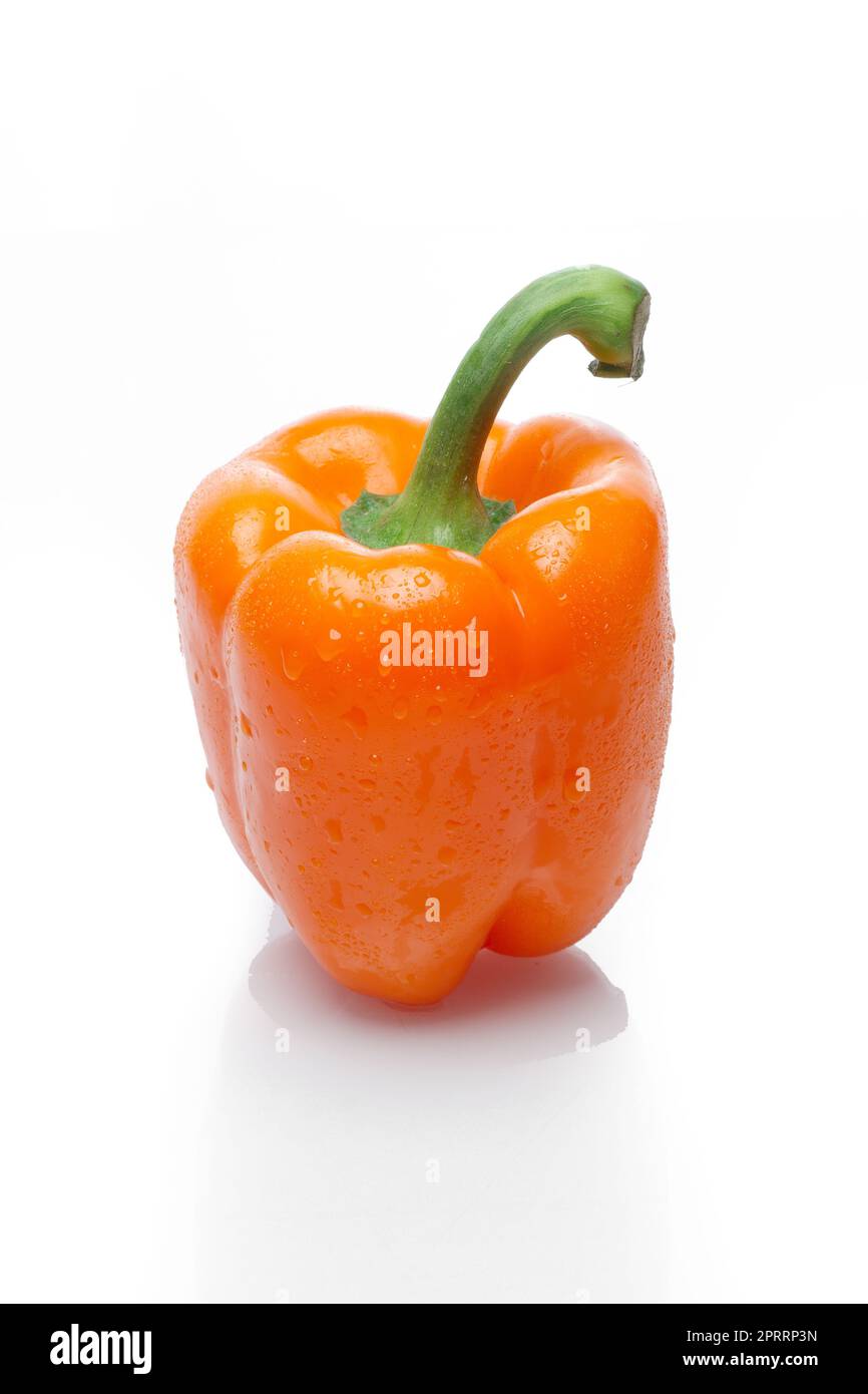 Sweet bell pepper with shadow on white background Stock Photo - Alamy