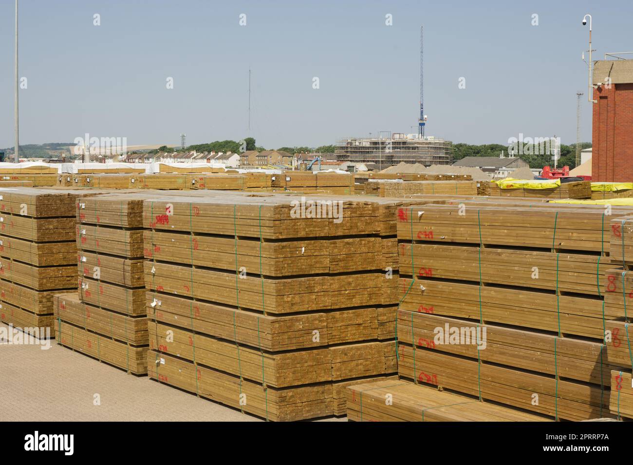 Stacks of timber at Shoreham Port, England Stock Photo - Alamy
