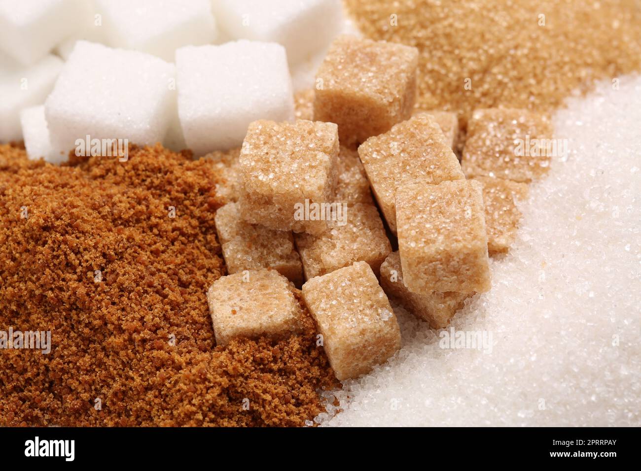 Different types of sugar as background, closeup Stock Photo - Alamy