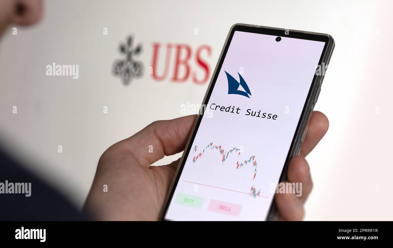 March 16th 2023. An investor analyzing the Credit Suisse stocks on a ...
