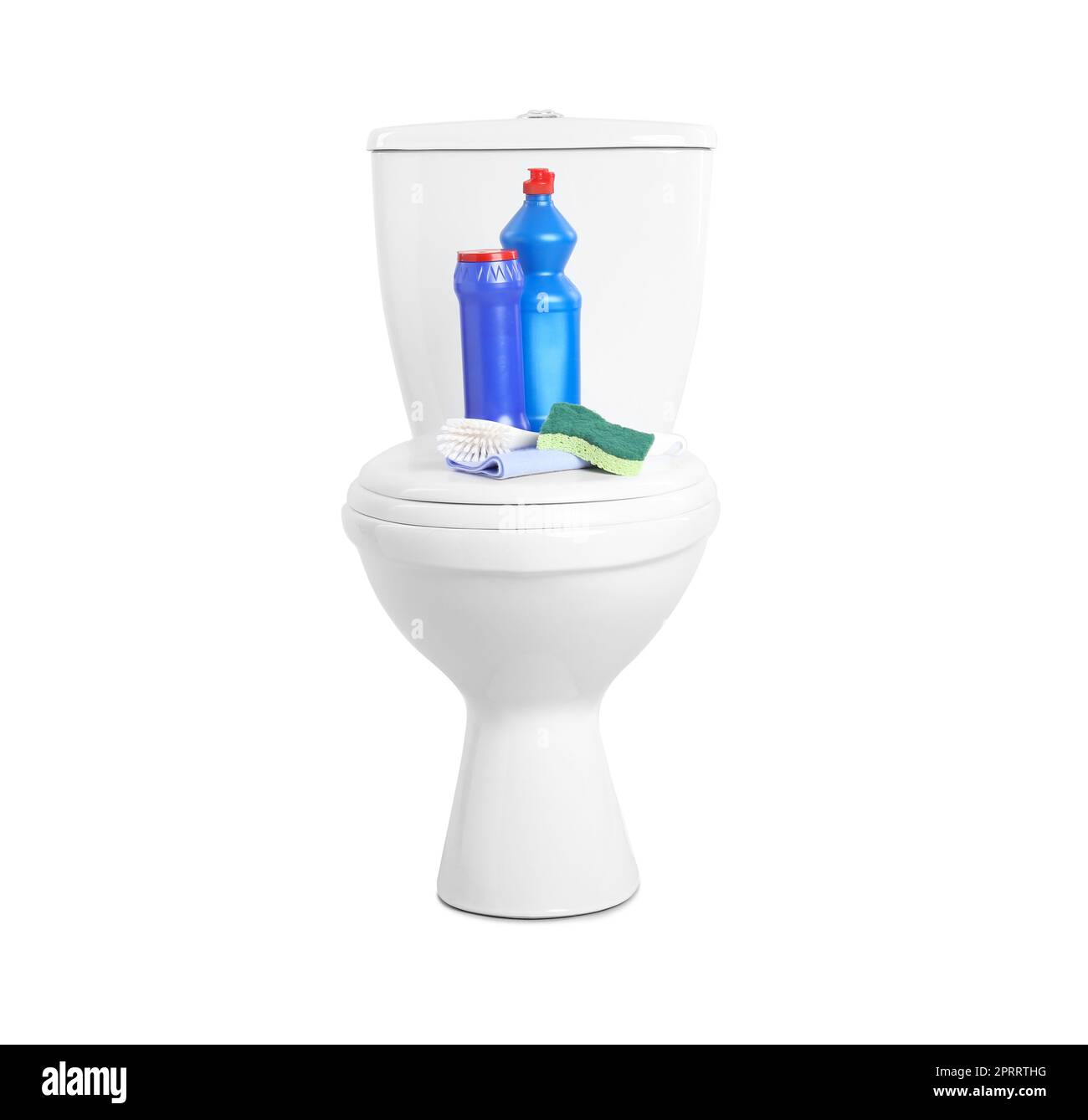 Different cleaning supplies on toilet bowl against white background ...
