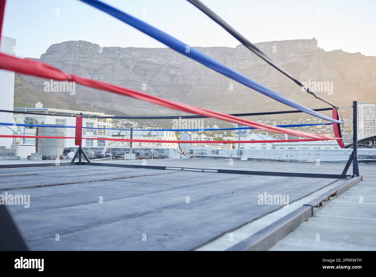 Outdoor, sports and empty boxing ring in the city for a wrestling ...