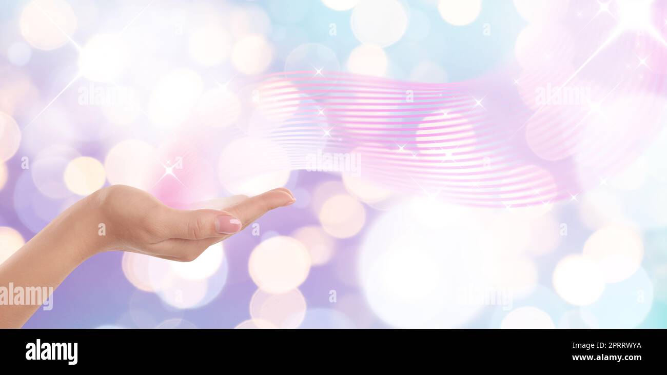 Concept of karma. Closeup view of woman and fairy light on color ...