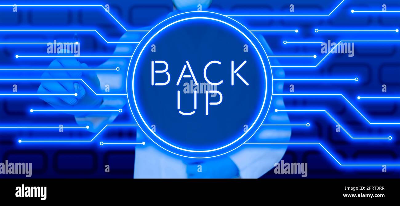 Conceptual caption Back Up. Business idea saving important data into ...