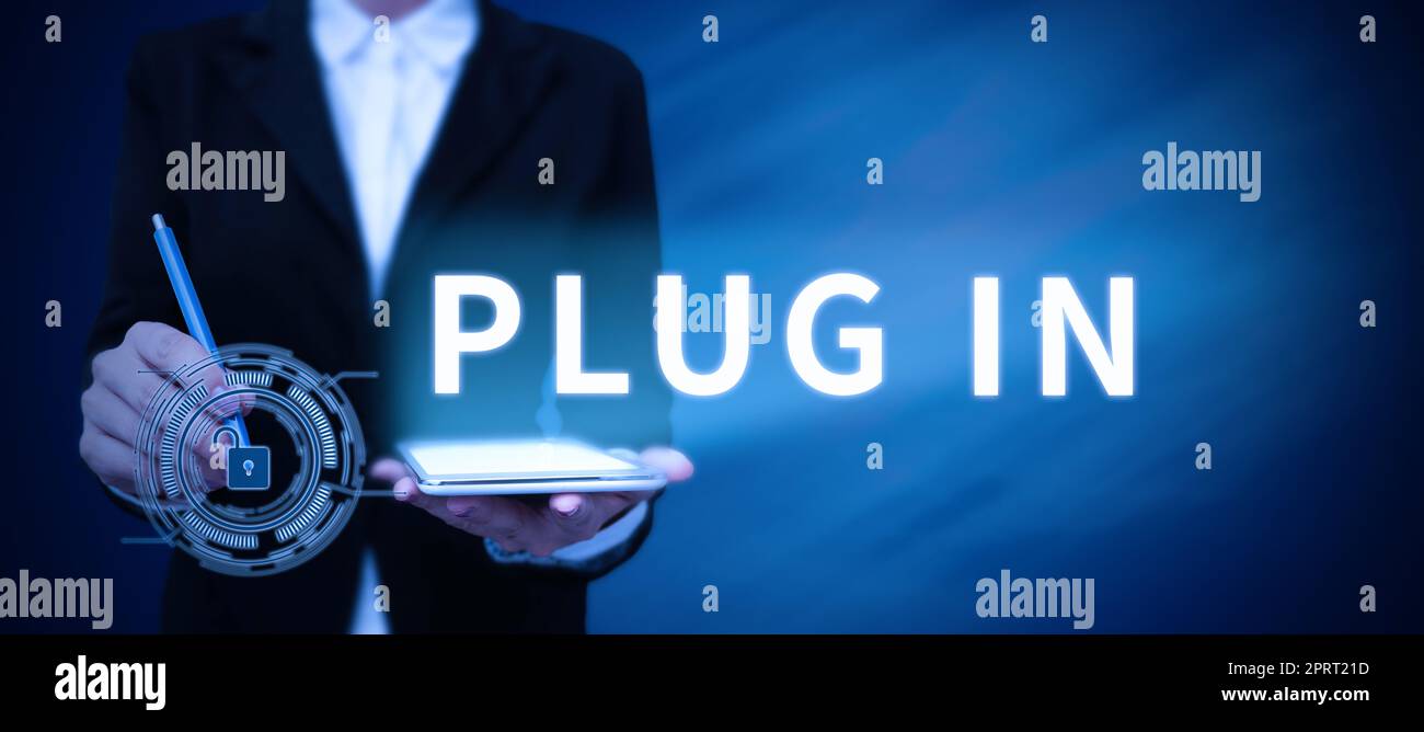 Hand writing sign Plug In. Word for putting device into electricity to ...