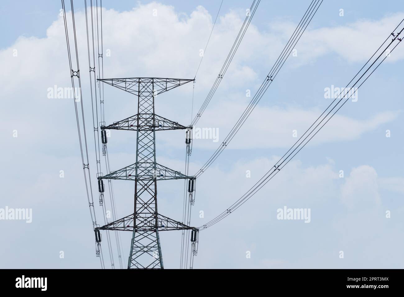 High voltage transmission towers line Stock Photo - Alamy