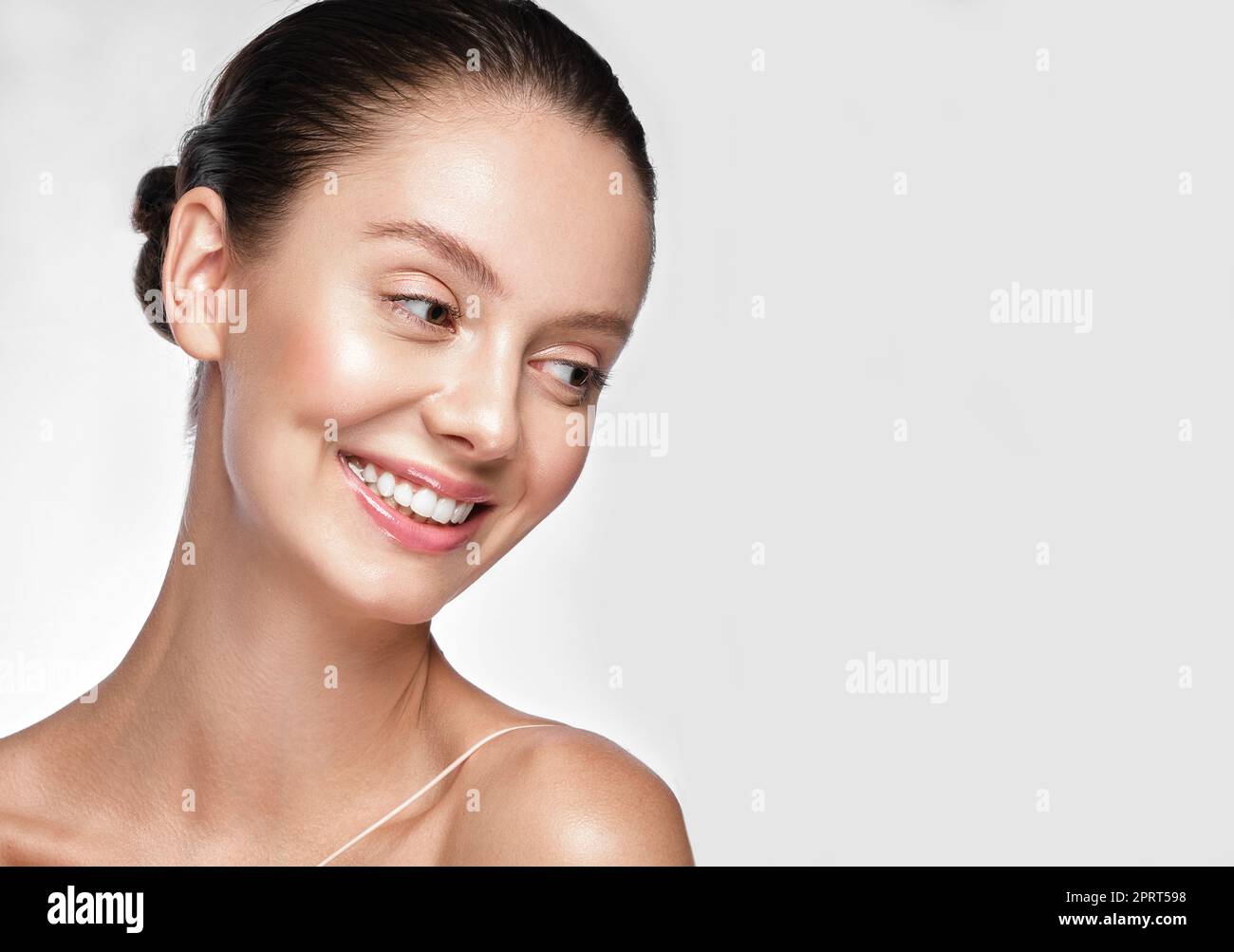 Portrait of beautiful woman with light natural make-up and perfect skin ...