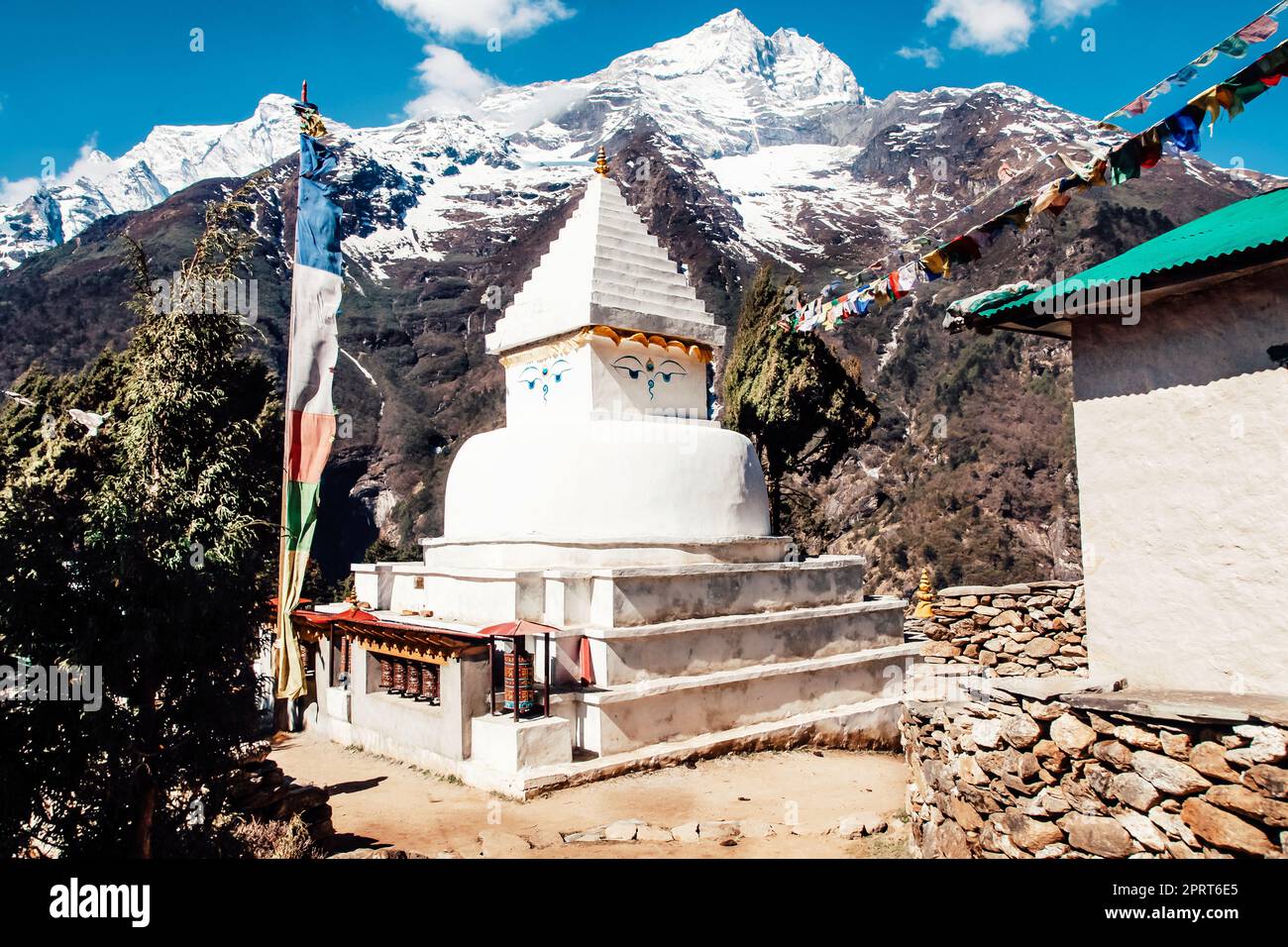 Beautiful traditional white stone Stupa with Budda eyes in Himalayas ...