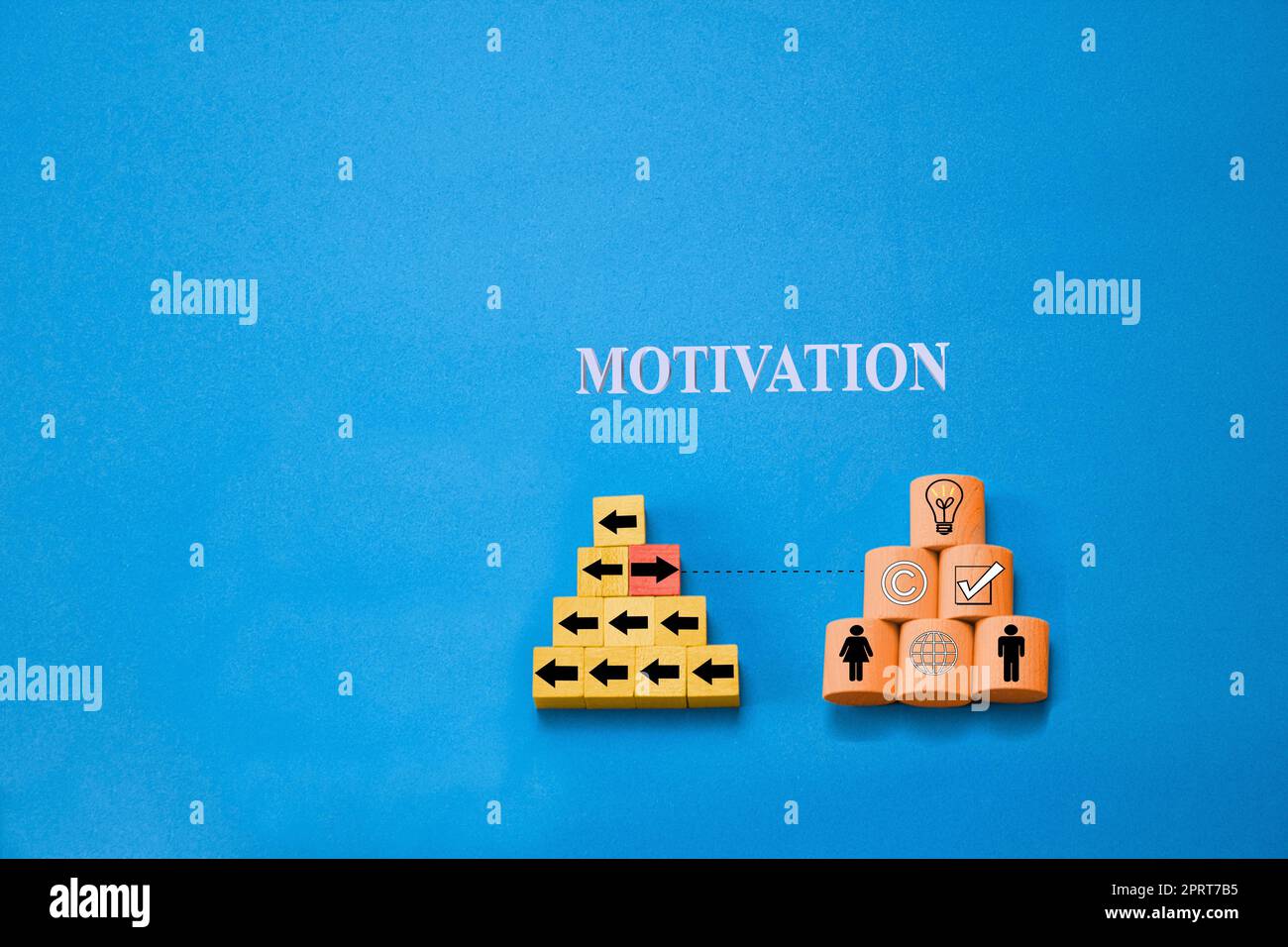 wooden blocks with drawn shapes showing the concept of business success ...