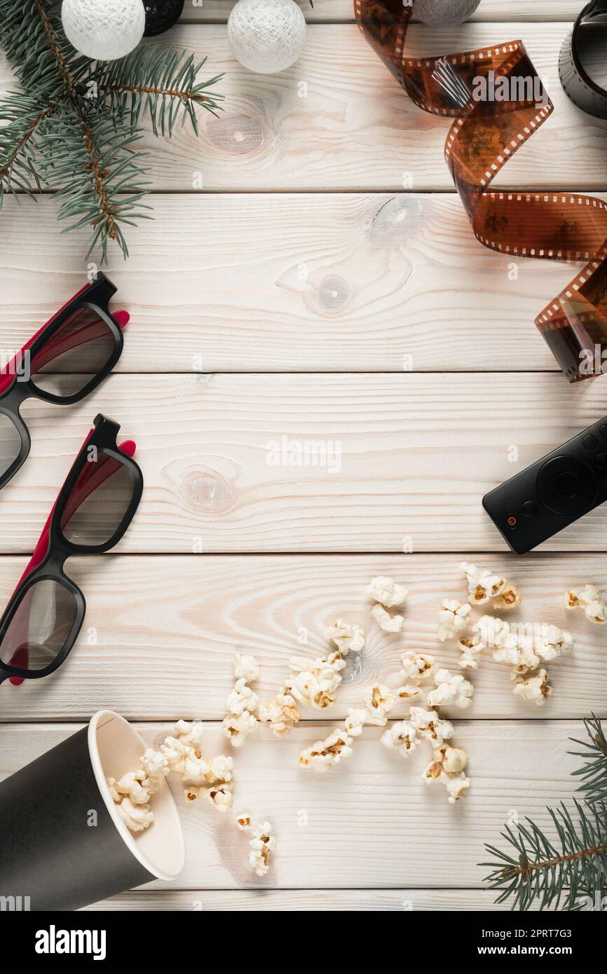 Vertical composition frame scattered popcorn, 3d glasses, film, fir ...