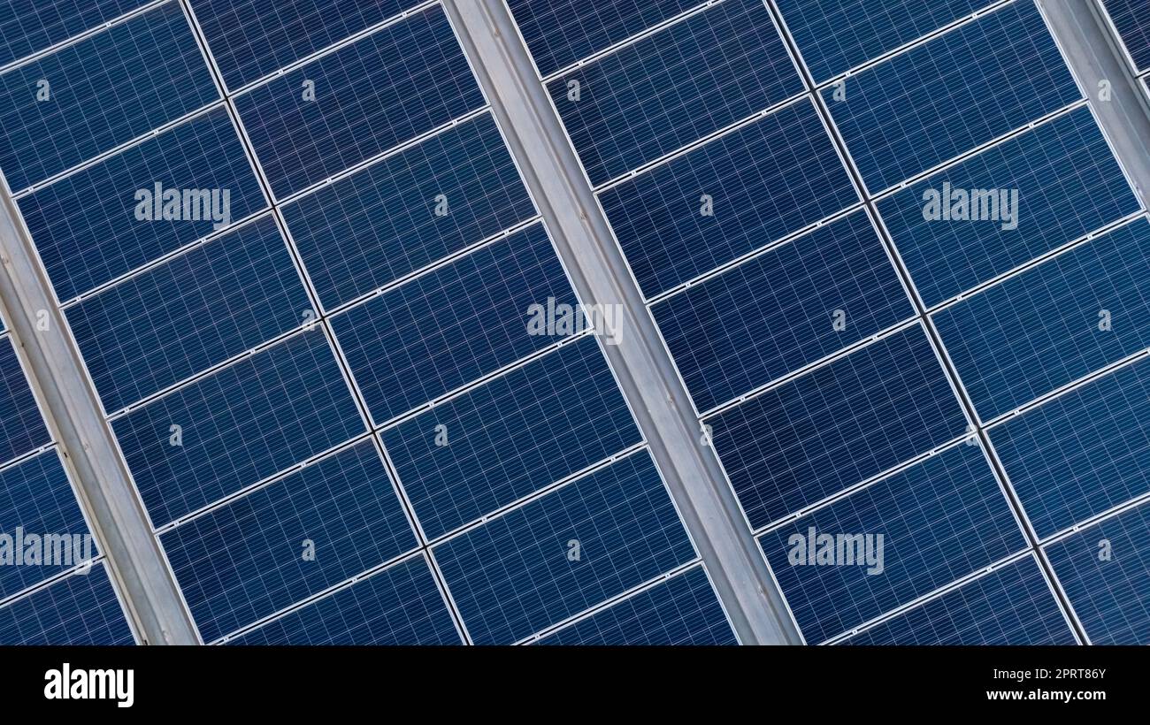 Aerial view of solar panels or photovoltaic module. Solar power for ...