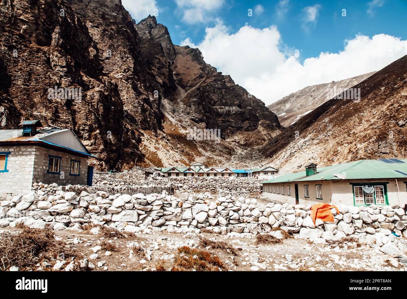 Small village among beautiful mountains in Himalaya. Nepal Stock Photo ...