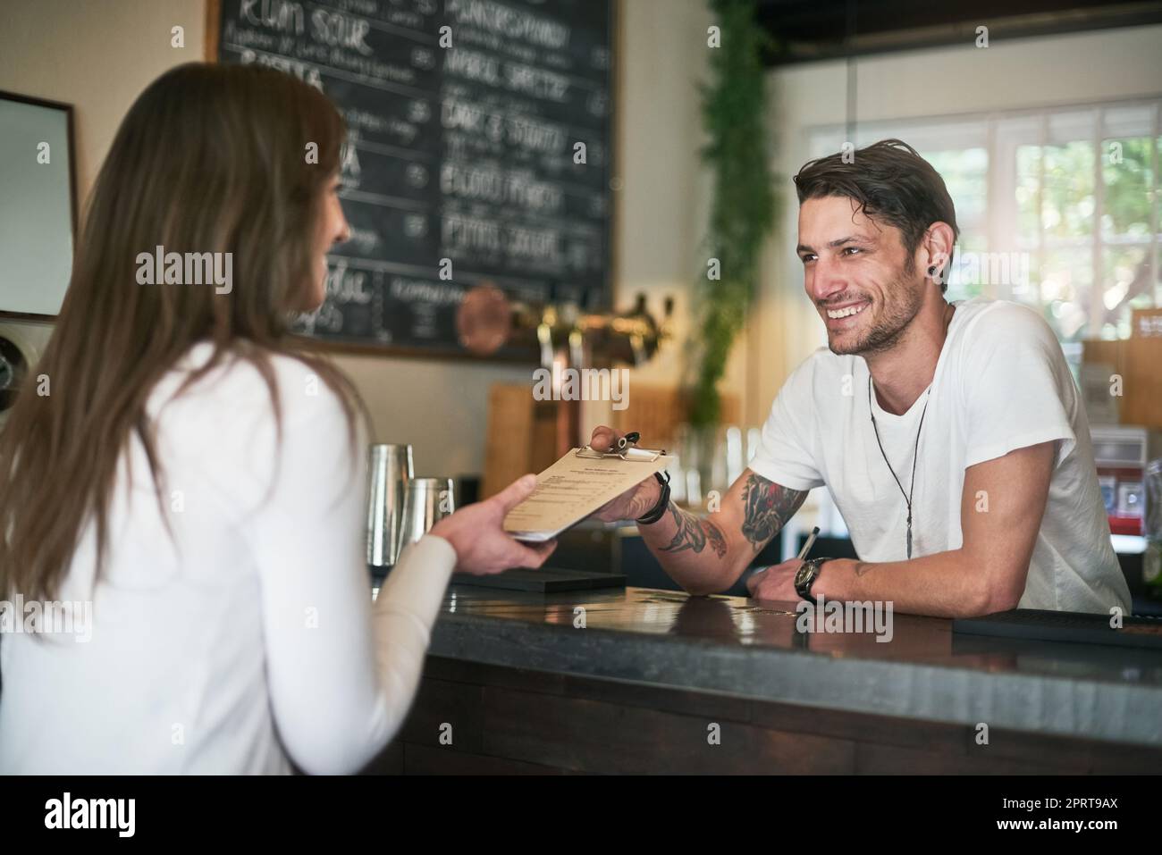Bartender taking order hi-res stock photography and images - Alamy