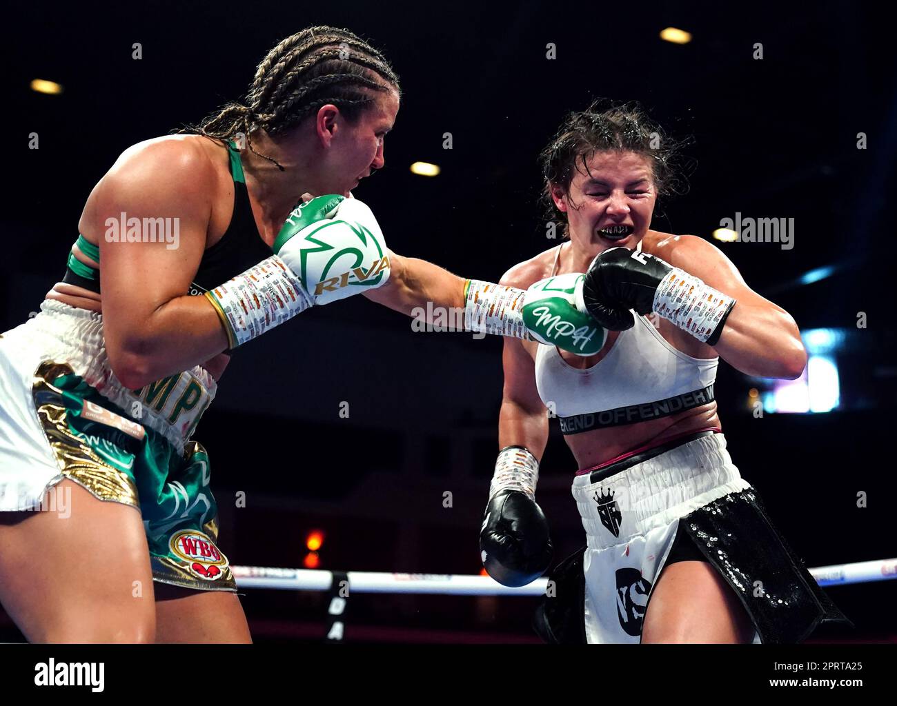 Sandy Ryan (right) and Marie Pier Houle in the WBO World Welter weight bout at Cardiff ...