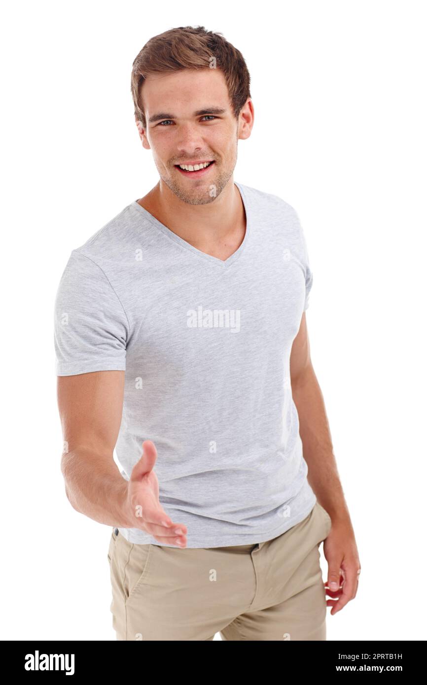 Nice to meet you. Portrait of a young man standing in a studio ...