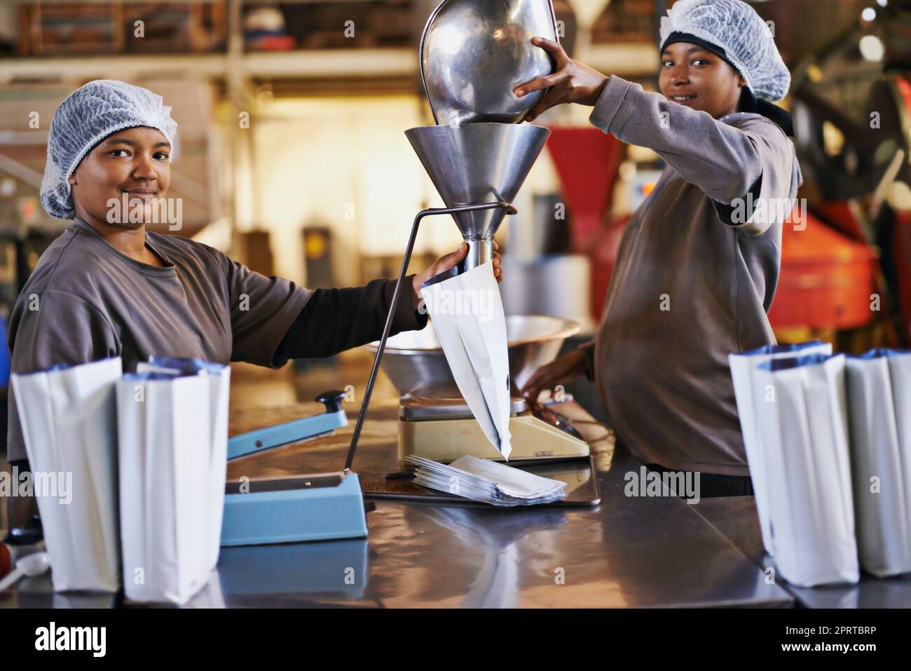 We only bag the best. workers in a coffee packaging and distribution ...