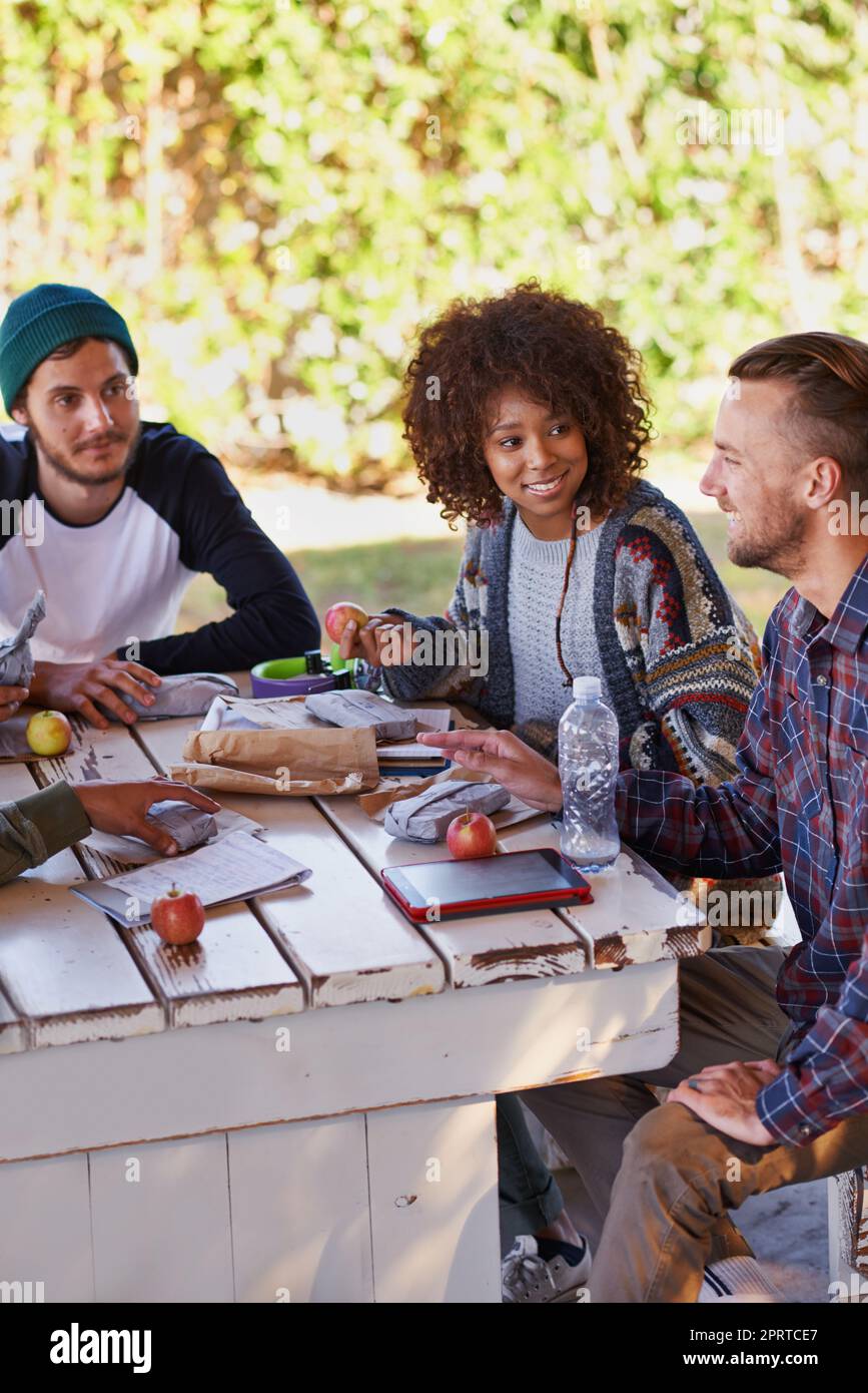 Group of men around a table hi-res stock photography and images - Alamy