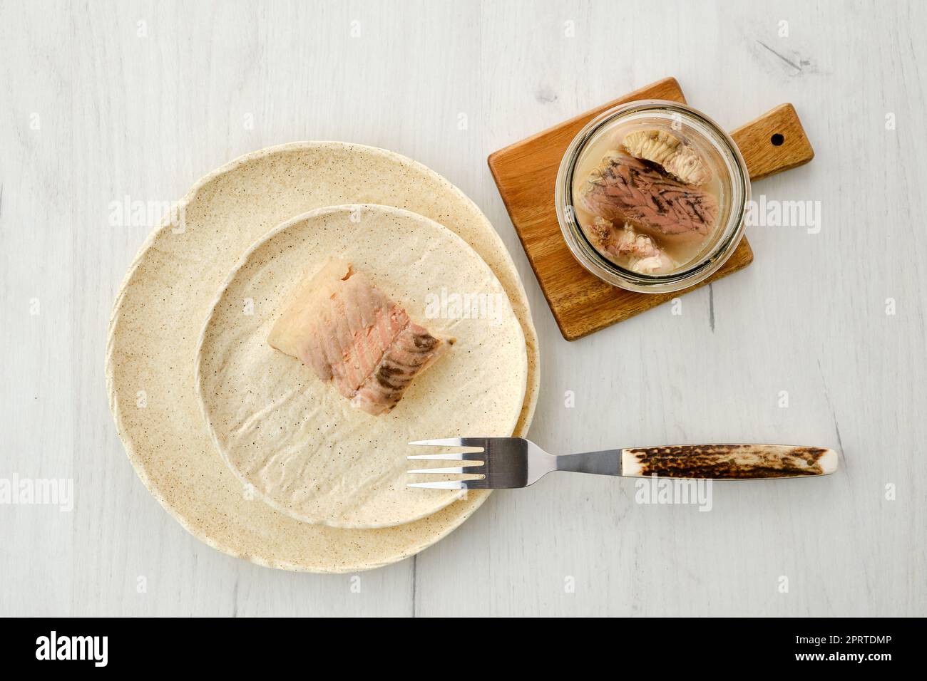 Top view of canned sturgeon on a plate Stock Photo - Alamy