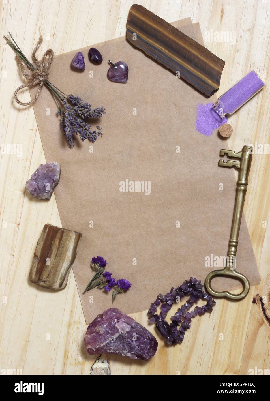 Amethyst Stones With Petrified Wood on Old Paper With Dried Flowers and ...