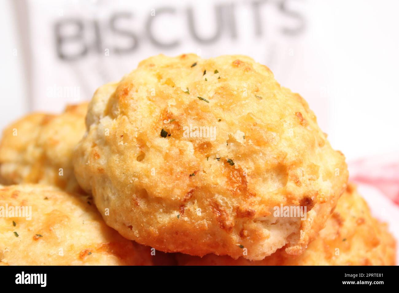 Fresh Garlic Cheese Biscuits With Biscuit Sign in Background Shallow ...