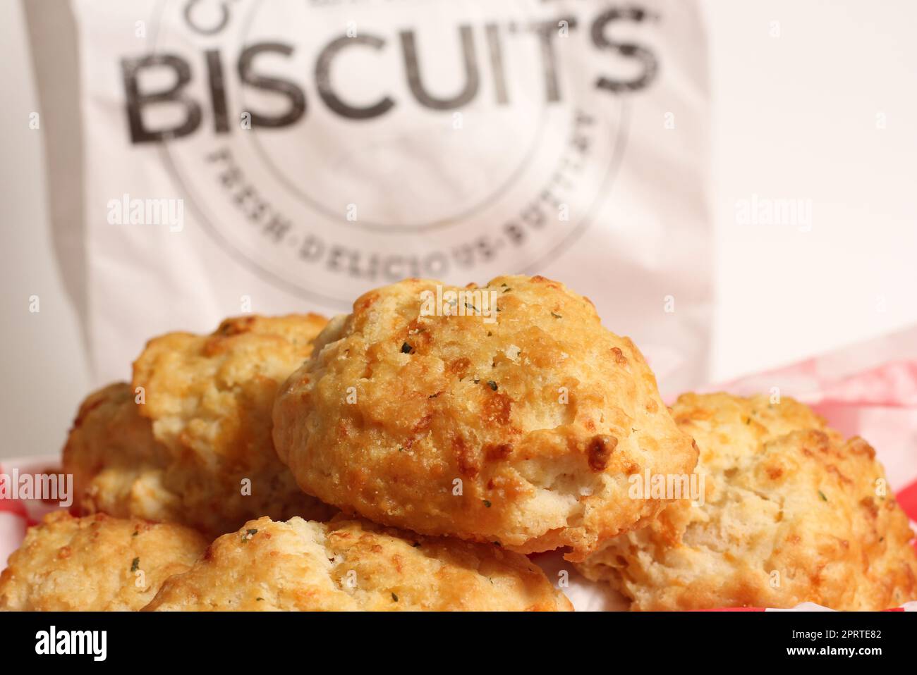 Fresh Garlic Cheese Biscuits With Biscuit Sign in Background Shallow ...