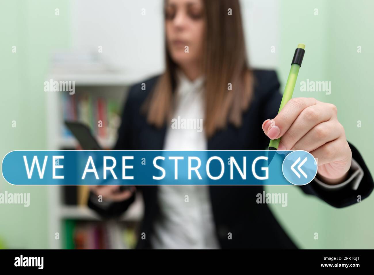 Hand writing sign We Are Strong. Word Written on Have great strength ...