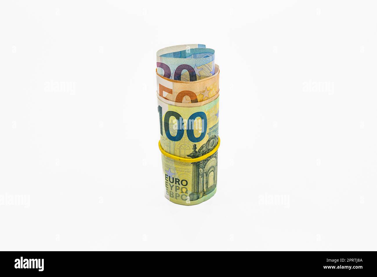 Roll of Euro notes in the elastic band. EU banknotes in a money roll ...