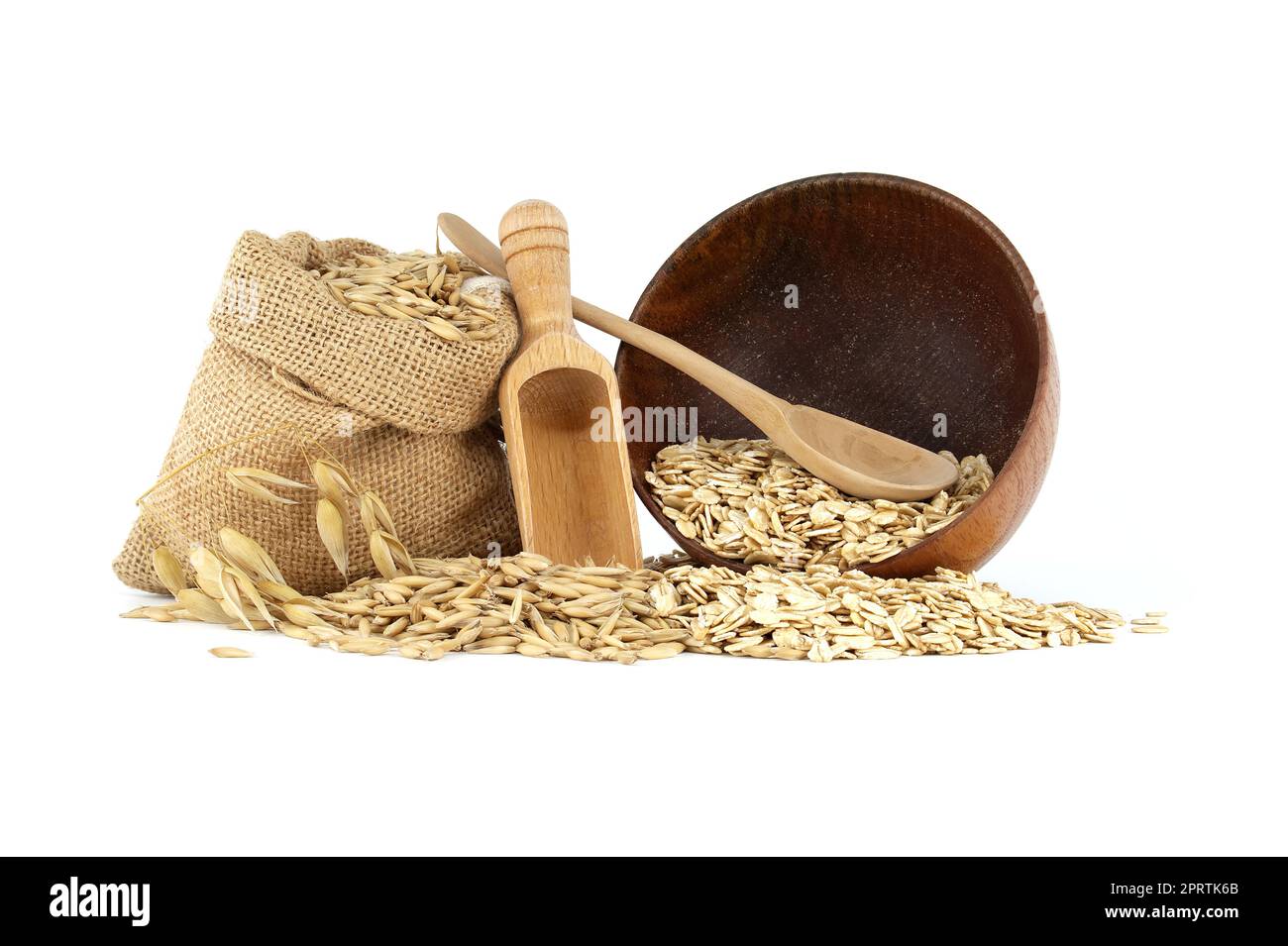 Whole oats grains and oat groats rolled and flattened into flakes ...