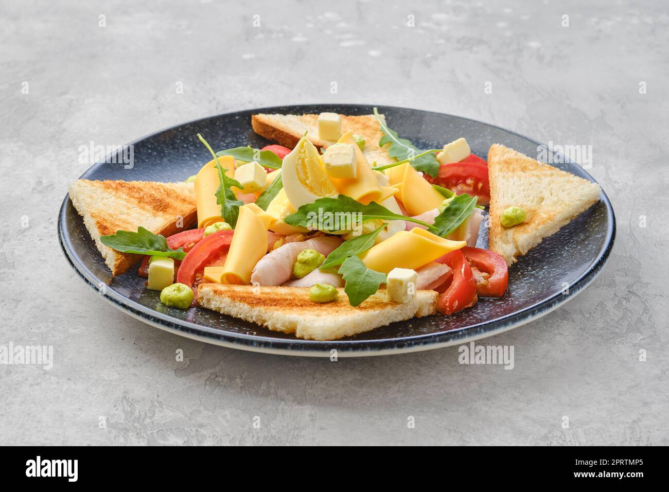 Pieces of toast, ham, boiled egg, cheddar and tomato Stock Photo - Alamy