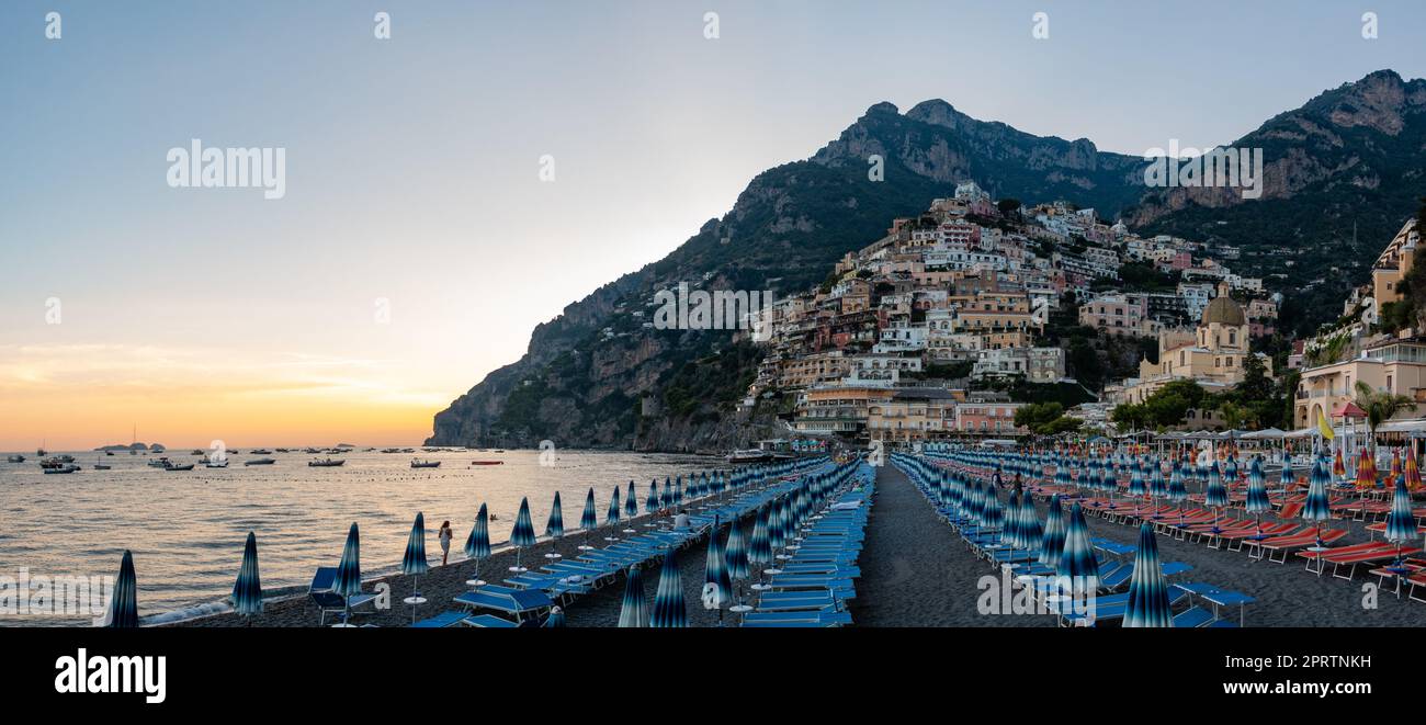 A panorama picture of the town of Positano at sunset Stock Photo - Alamy