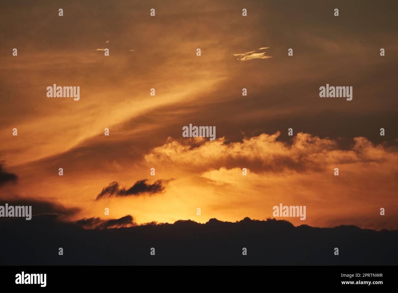 Vivid colors of sunset sky with clouds Stock Photo - Alamy