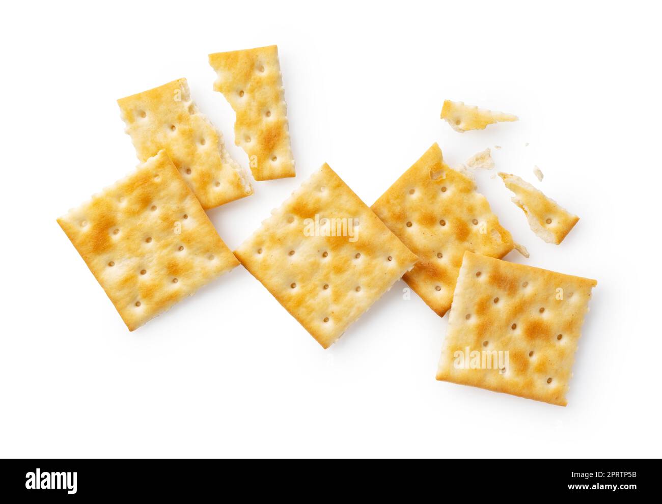 Broken crackers placed on a white background. Viewed from above Stock ...