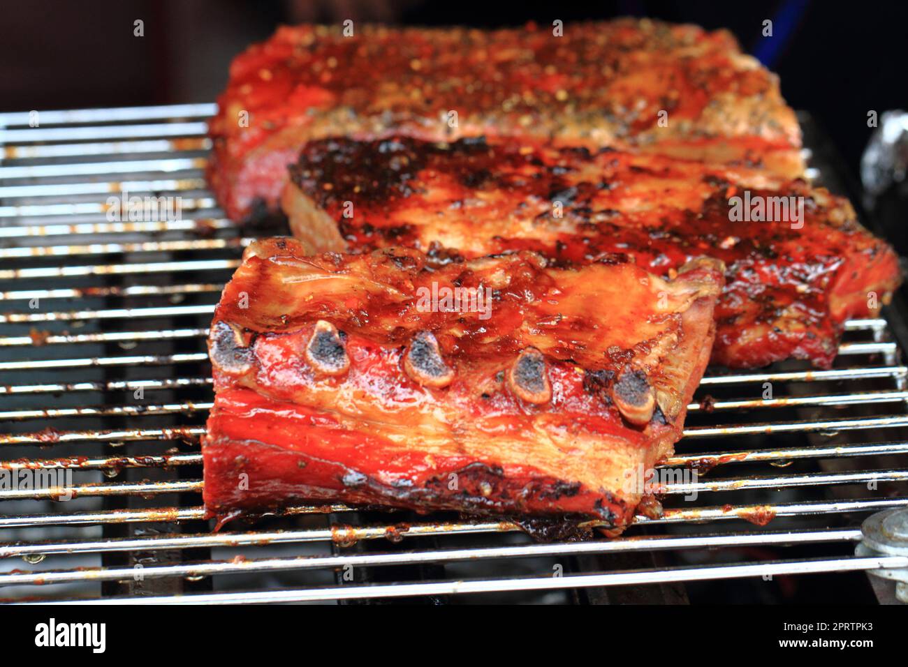 grilled pig ribs as nice food background Stock Photo - Alamy
