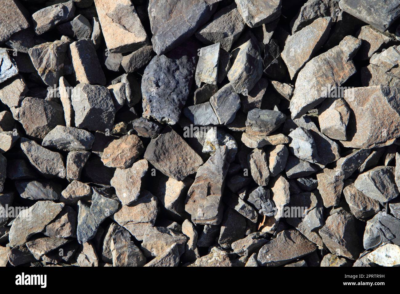 stones on the sun texture as nice background Stock Photo - Alamy
