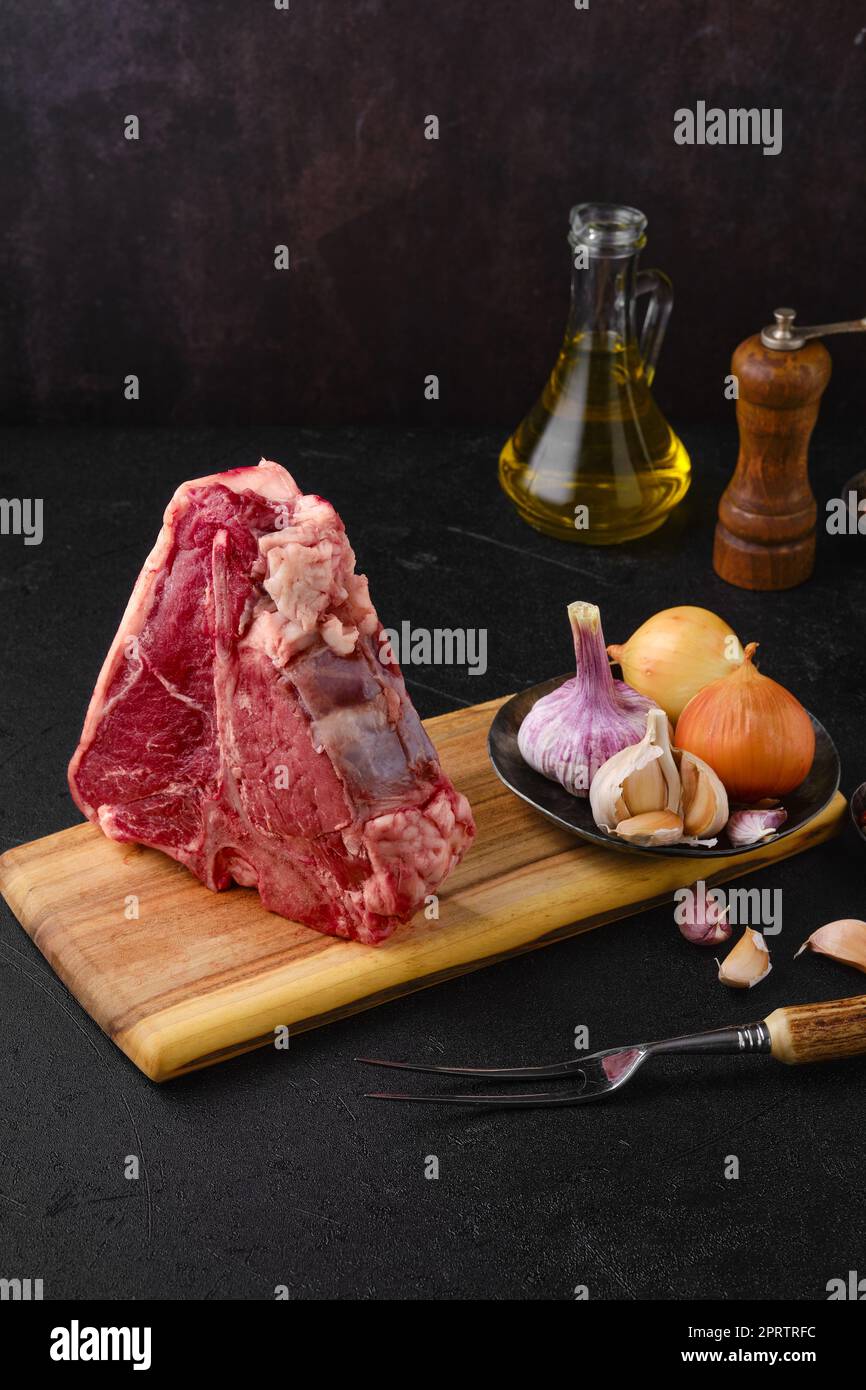 Raw porterhouse steak with spice ready for cooking Stock Photo - Alamy
