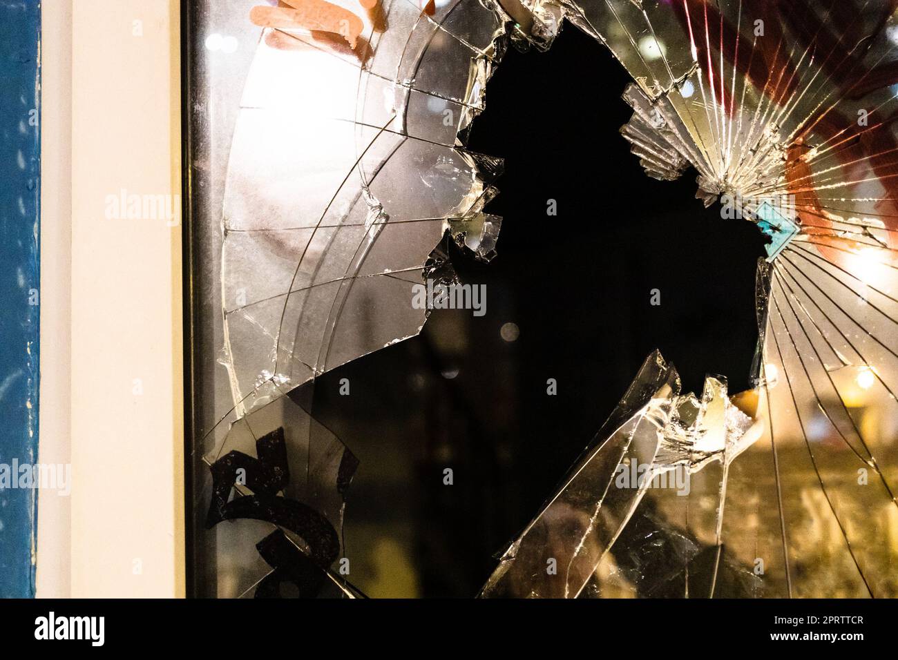 broken window glass in entrance of residential building at night Stock ...