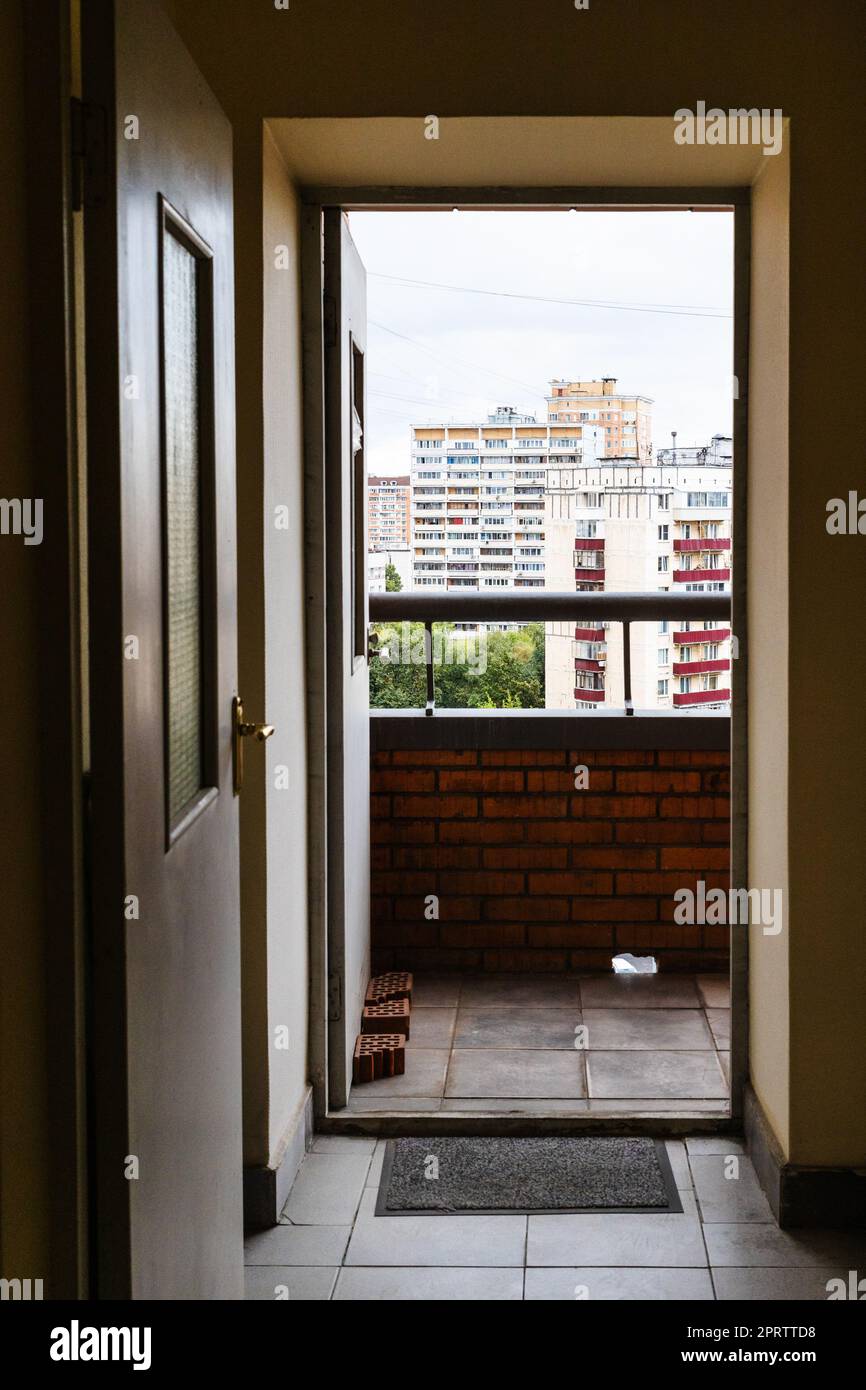 door to outdoor balcony in city high-rise house Stock Photo - Alamy