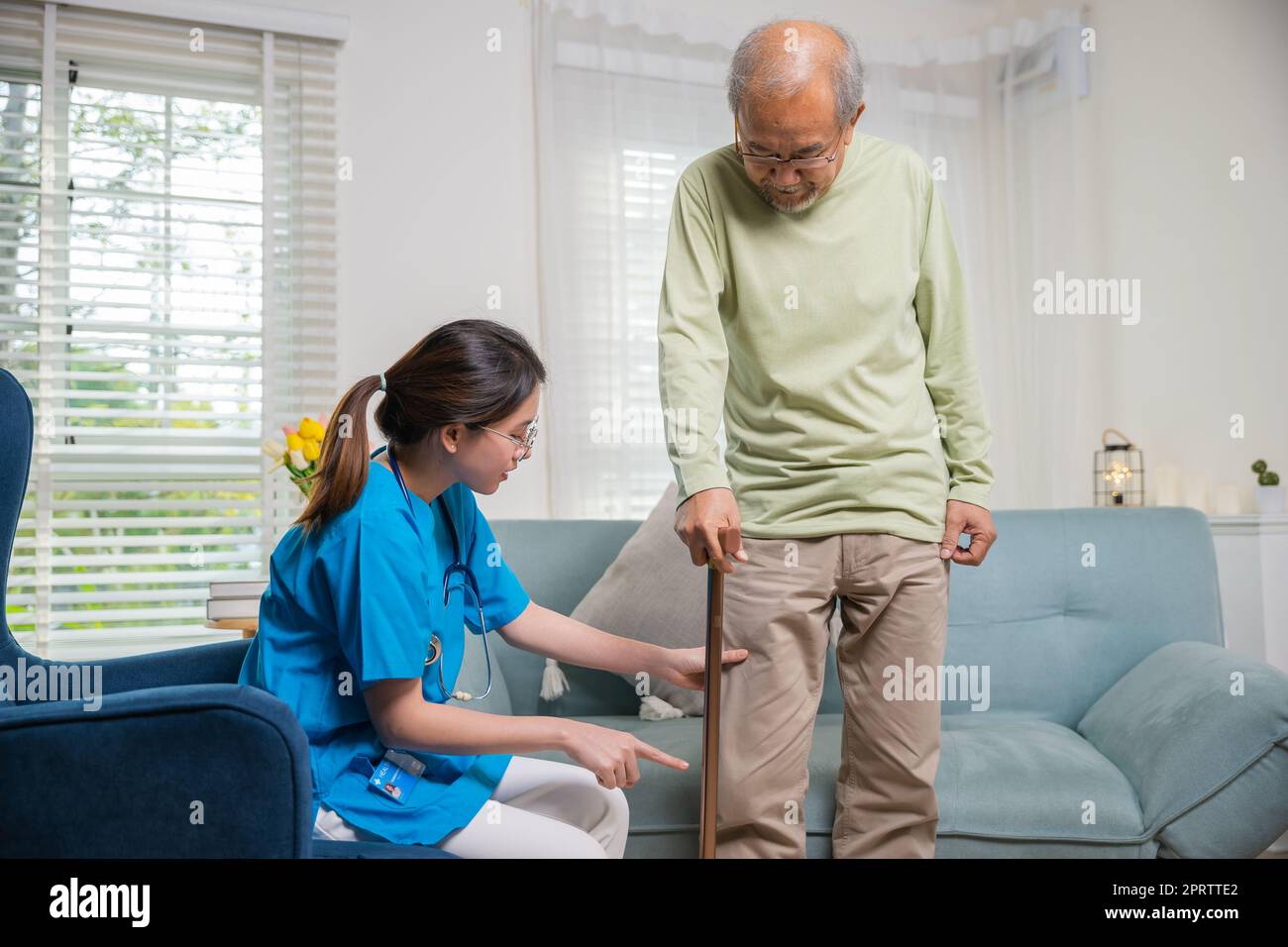 Asian doctor asking and explanation elderly man about pain symptom with ...