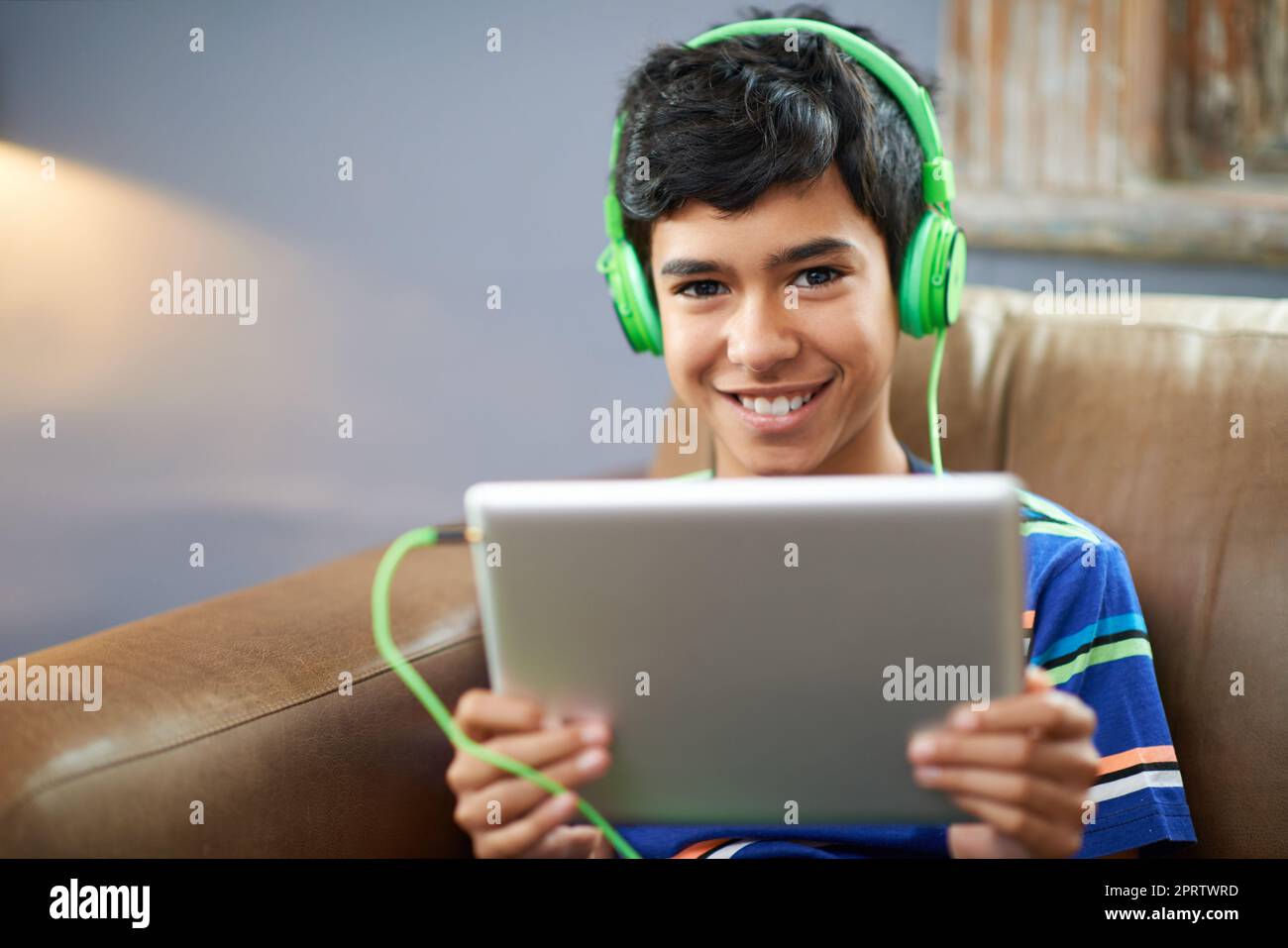 Ethnic children using technology i hi-res stock photography and images ...