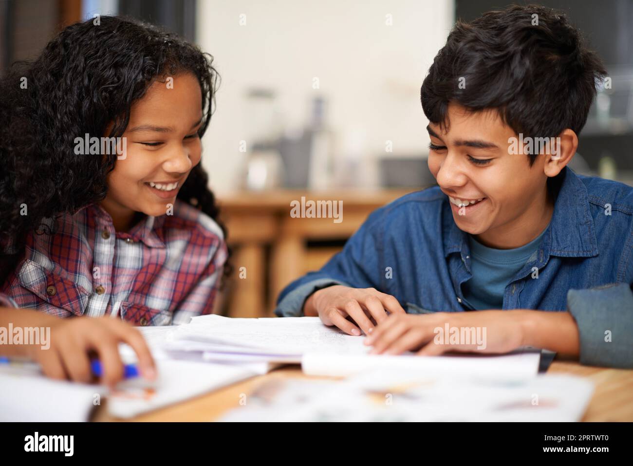 Two Kids Reading Together
