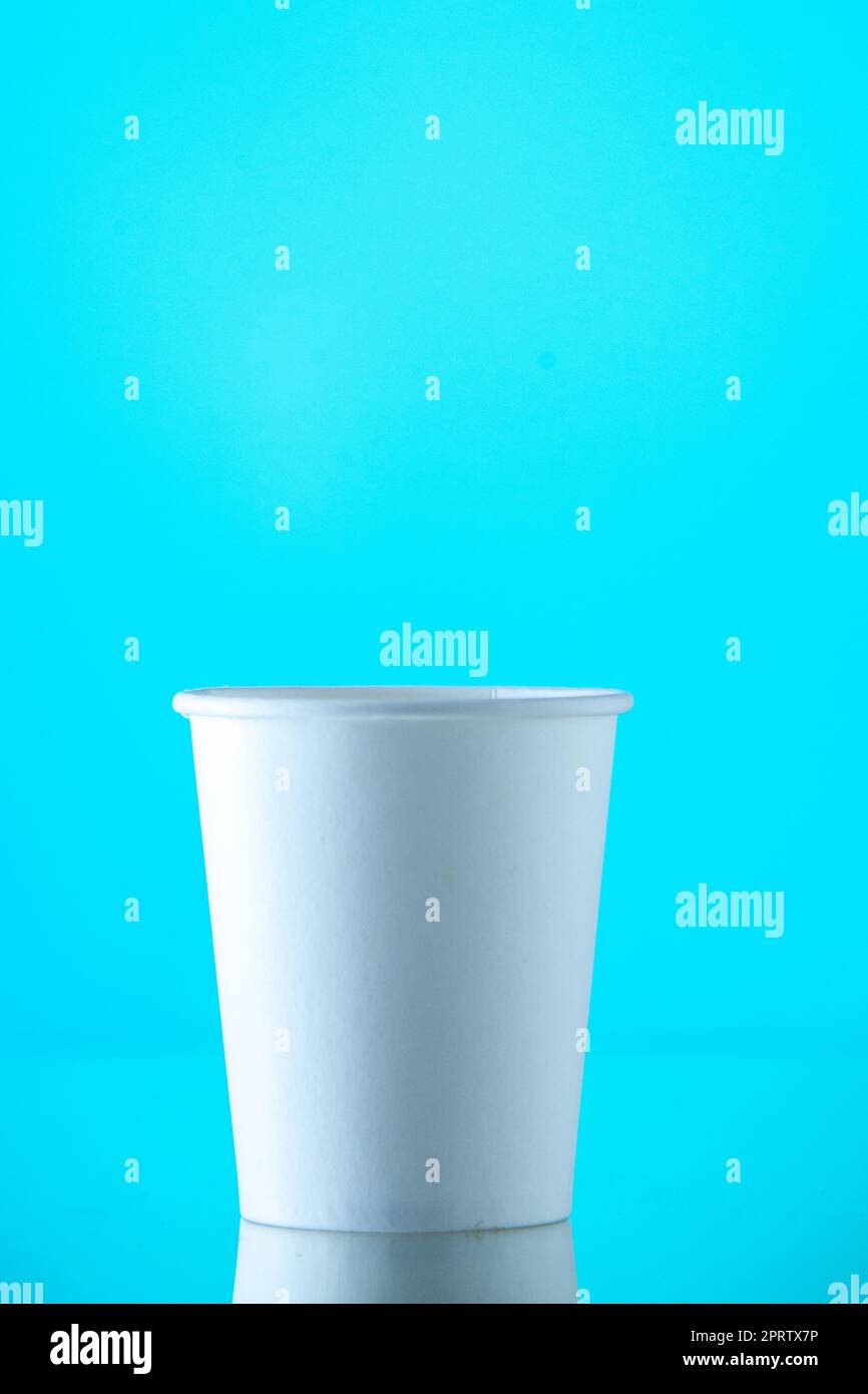 front view paper water cup on sky blue background stock photo Stock ...