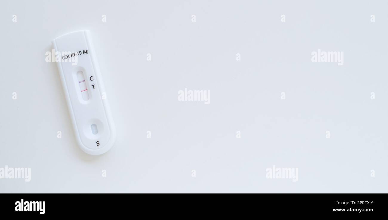Coronavirus Covid-19 antigen test with positive result on white ...