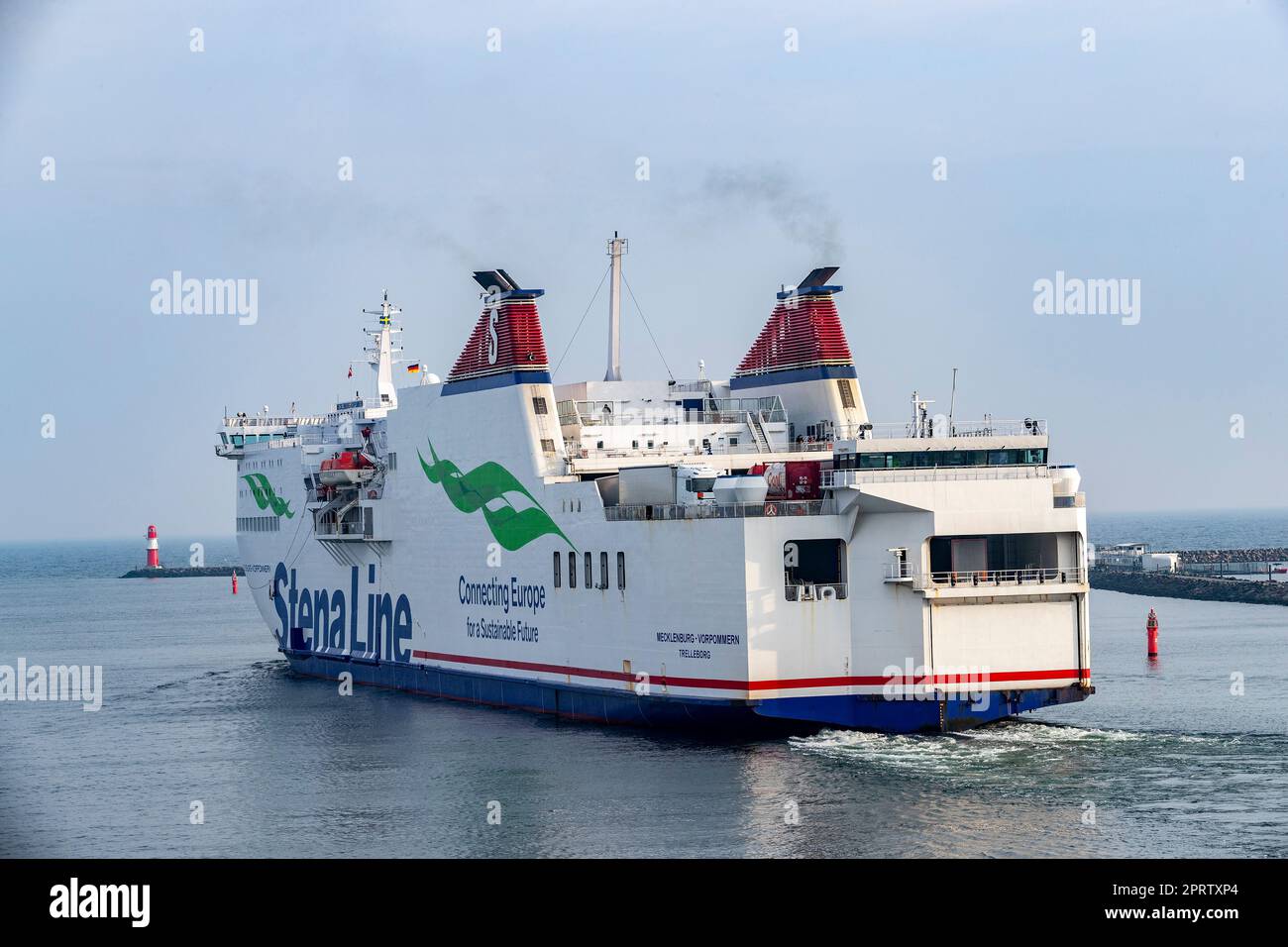 Tinkerbell of the TT-Line ferry leaving the harbour entrance of ...
