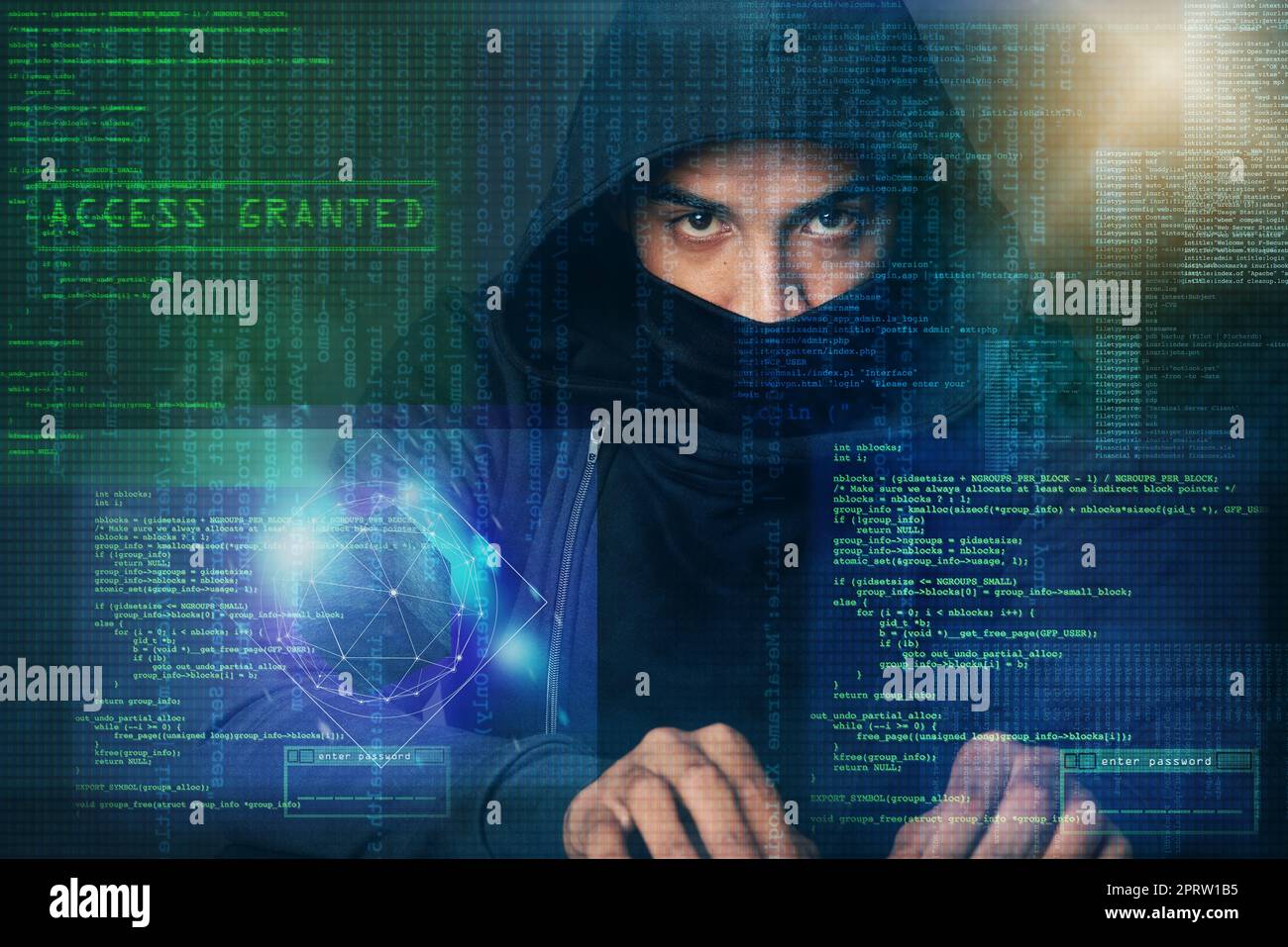 Im coming for you next. Portrait of a menacing computer hacker posing ...