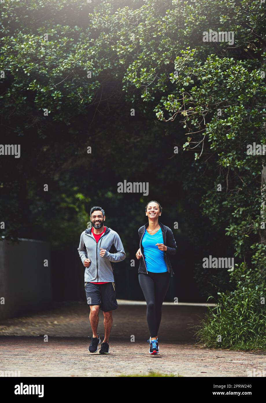 Nature is a perfect buff-body training ground. a couple out running ...